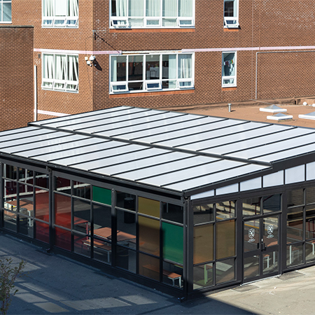 Free-standing mono-pitch canopy has been installed at a St Helens school