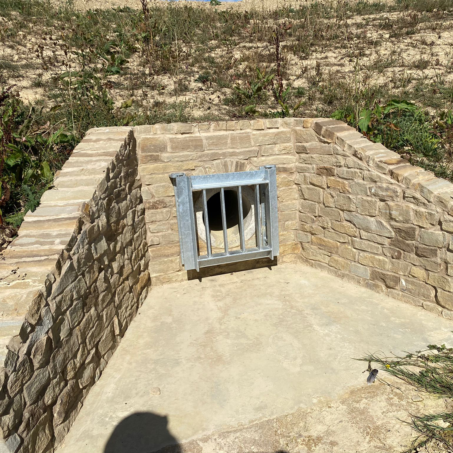 Cladding precast concrete headwalls