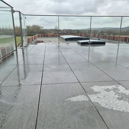 Rail System for porcelain tiles using Mega Balance adjustable pedestals