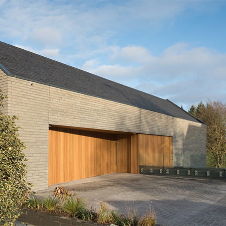 Hidden in plain sight – how to create seamlessly integrated garage doors