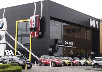 Sleek modern façade for Cooper BMW/Mini premises Thames Ditton, Surrey
