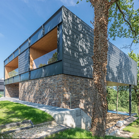 Natural slate rainscreen cladding for showroom